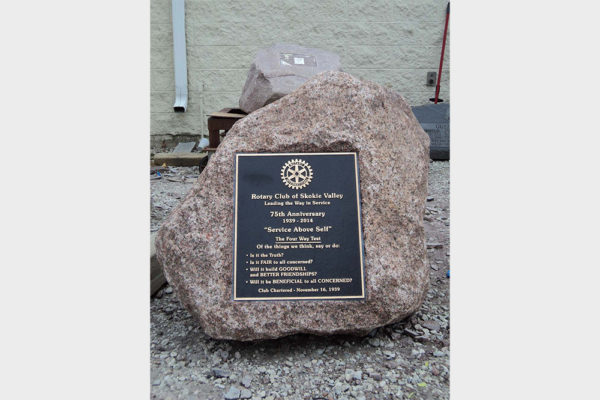 Bronze plaque with Rotary emblem recessed in granite boulder – City ...